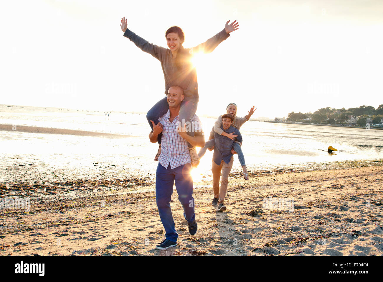 Giving piggyback ride hi-res stock photography and images - Alamy