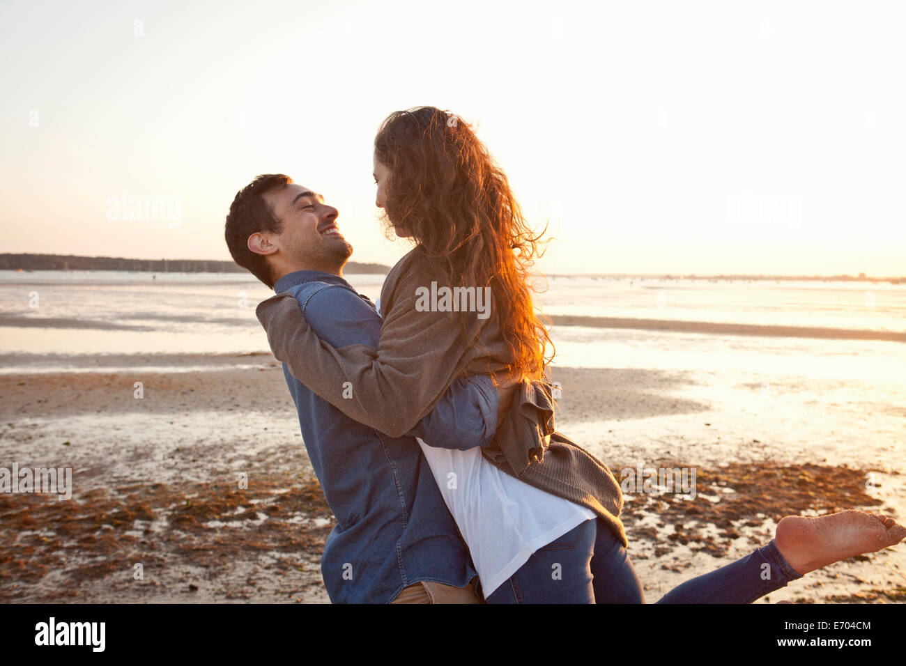 Couple having fun at the beach hi-res stock photography and images - Alamy