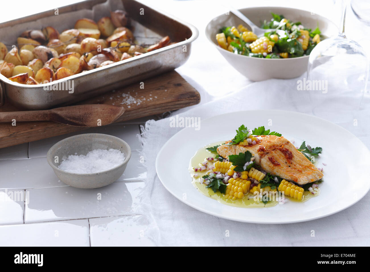 Blue-eye trevalla with corn and parsley Stock Photo - Alamy