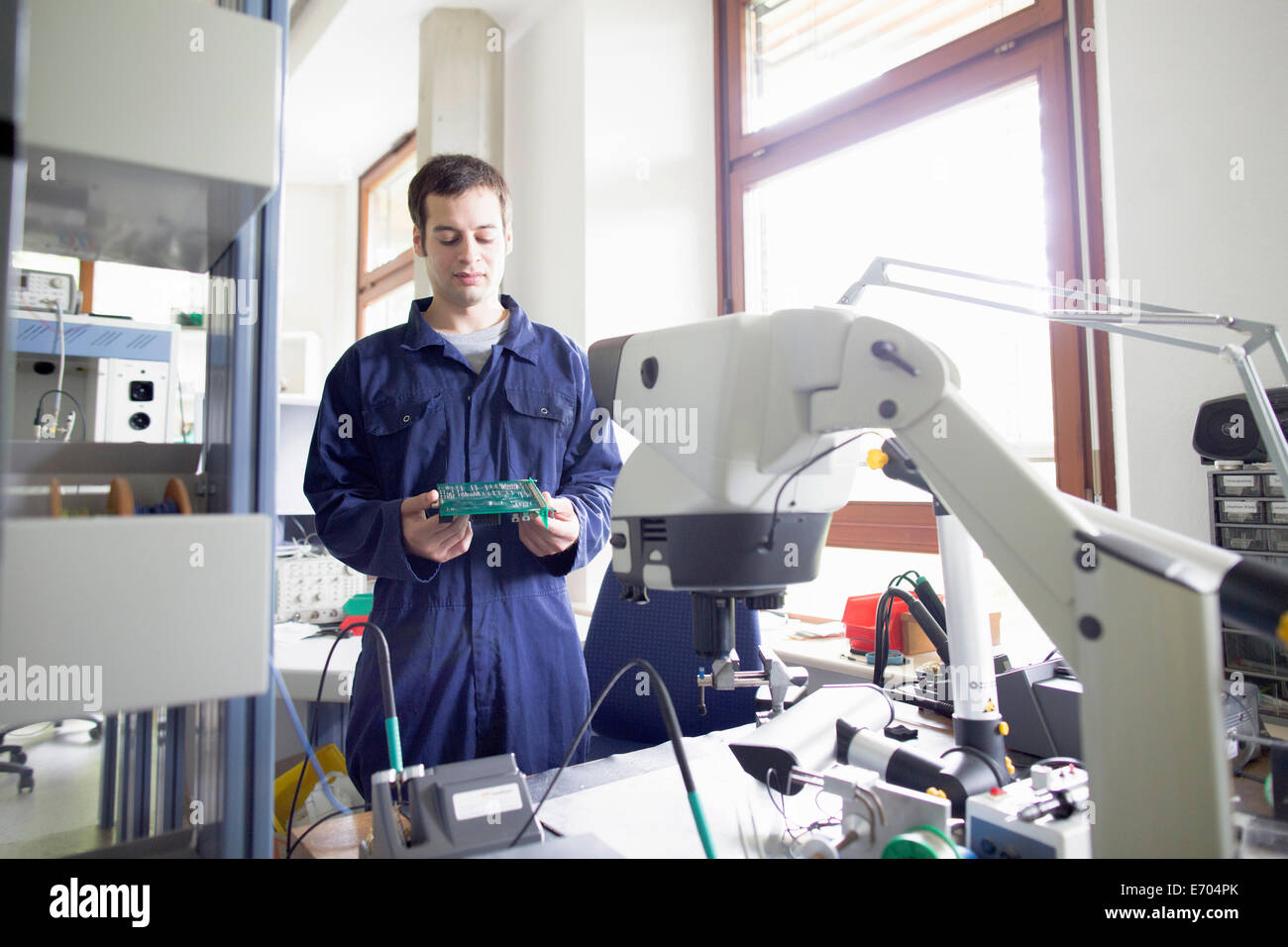 Male electrician looking down circuit hi-res stock photography and ...
