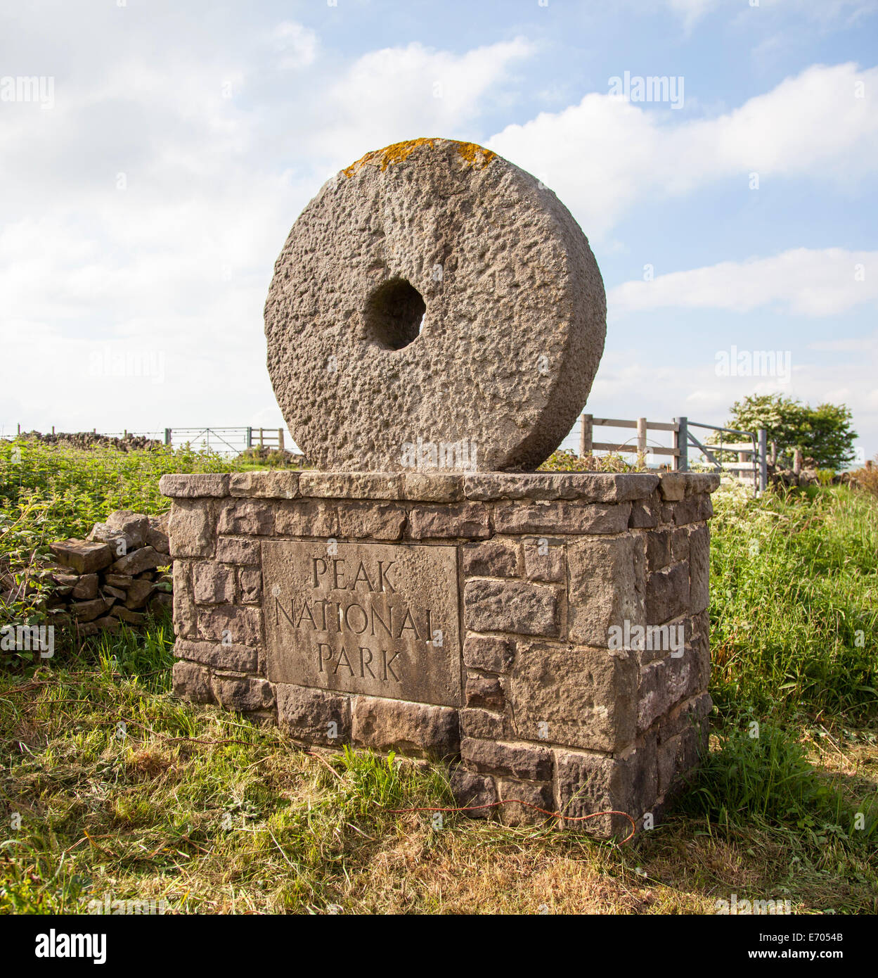Peak District National Park millstone or mill stone boundary totem or ...