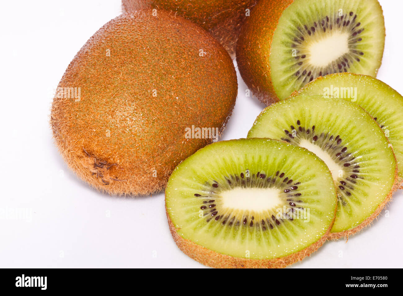 kiwi on paper background Stock Photo - Alamy