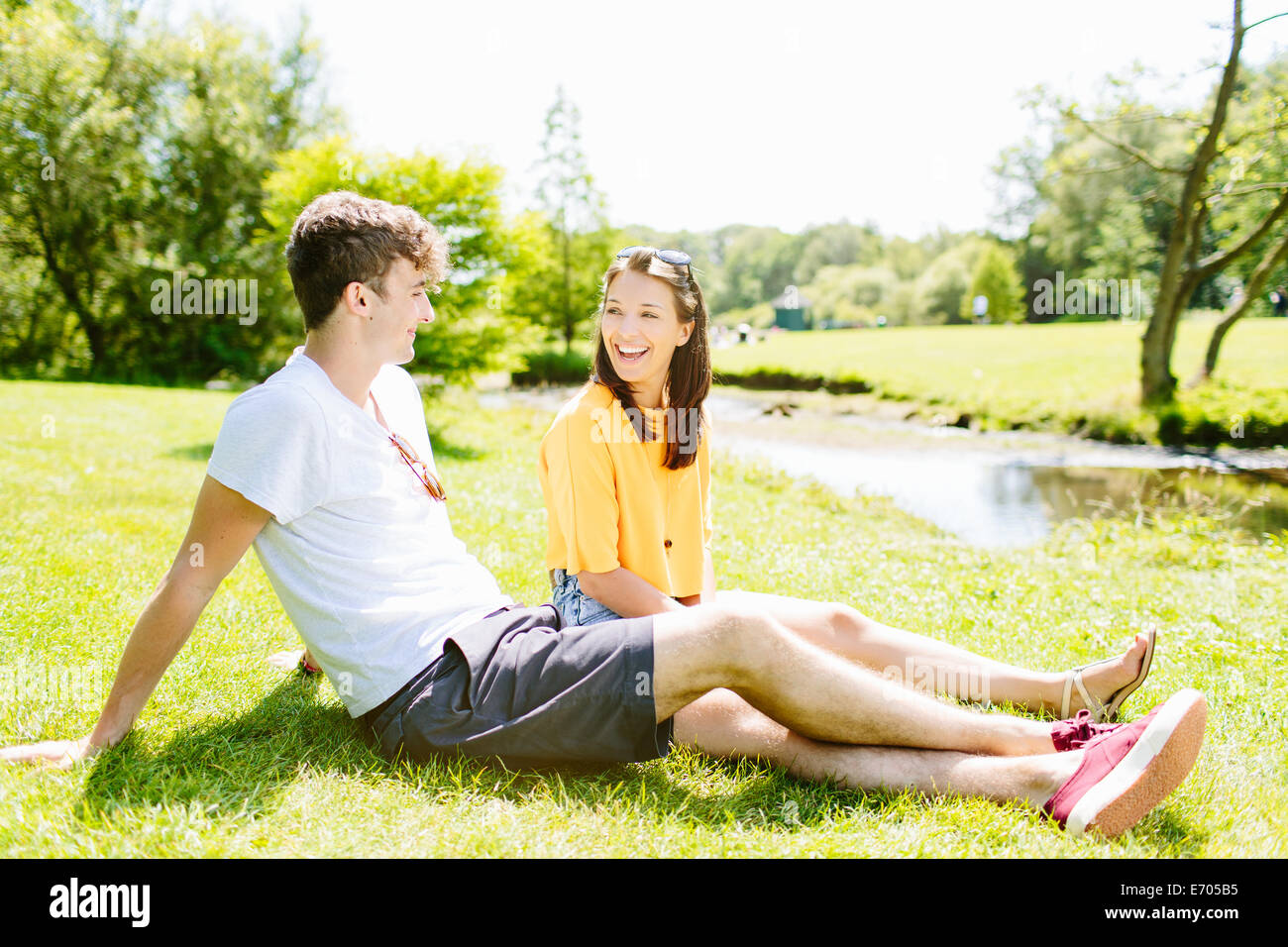 Female in sunglasses sitting hi-res stock photography and images - Alamy