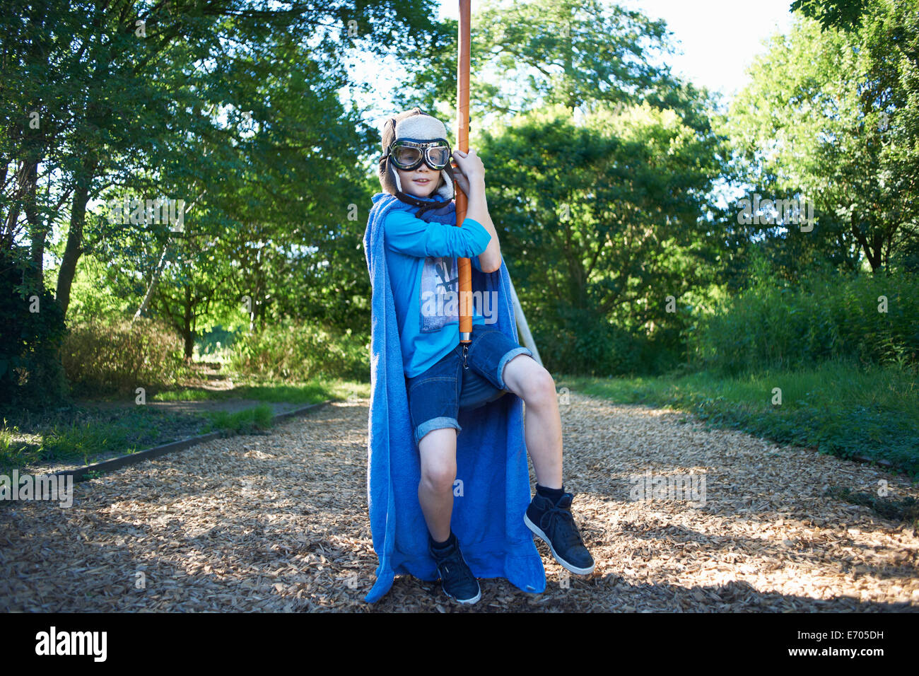 Young boy in fancy dress, on zip wire Stock Photo - Alamy
