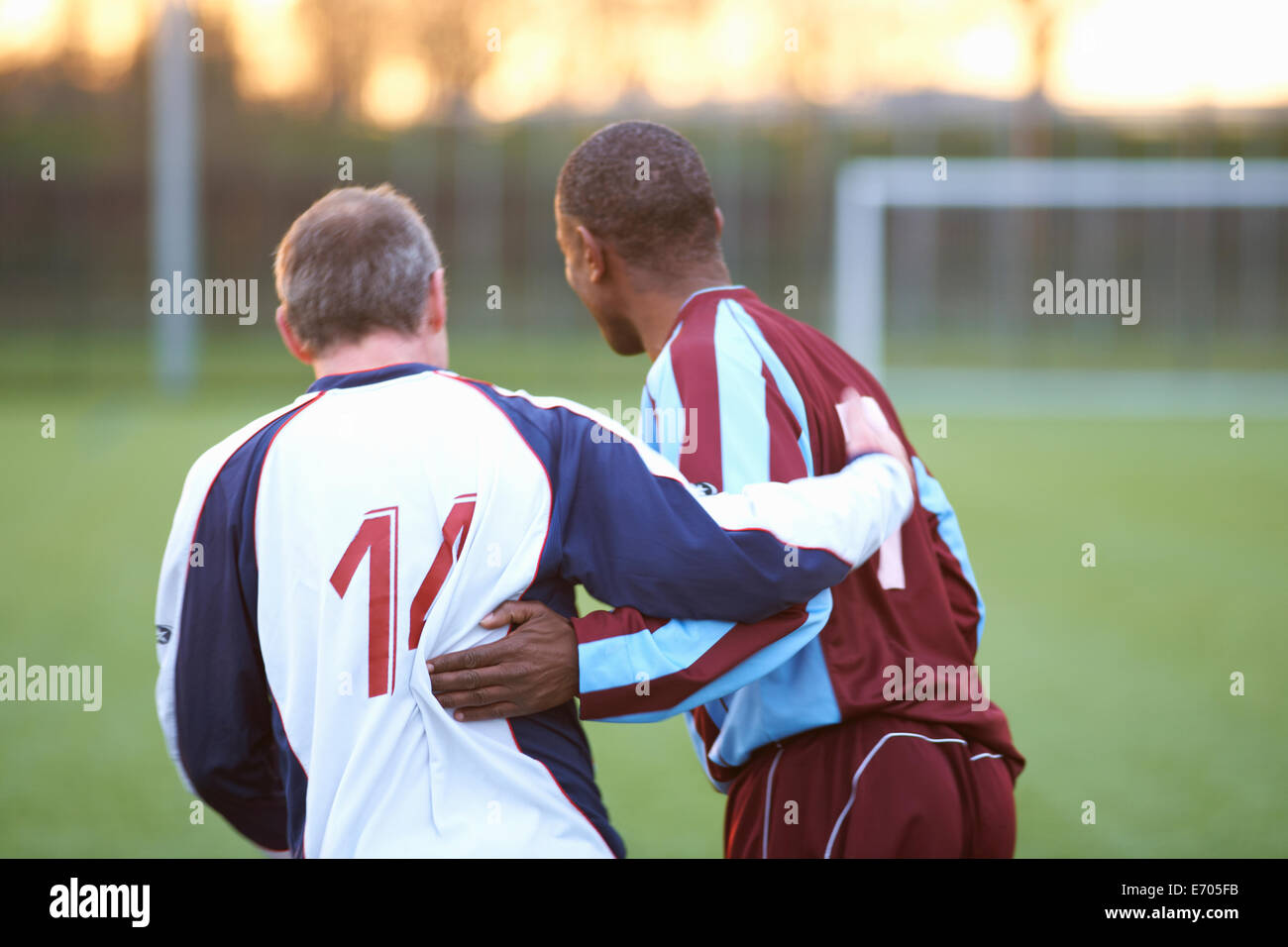Football players hugging hi-res stock photography and images - Alamy