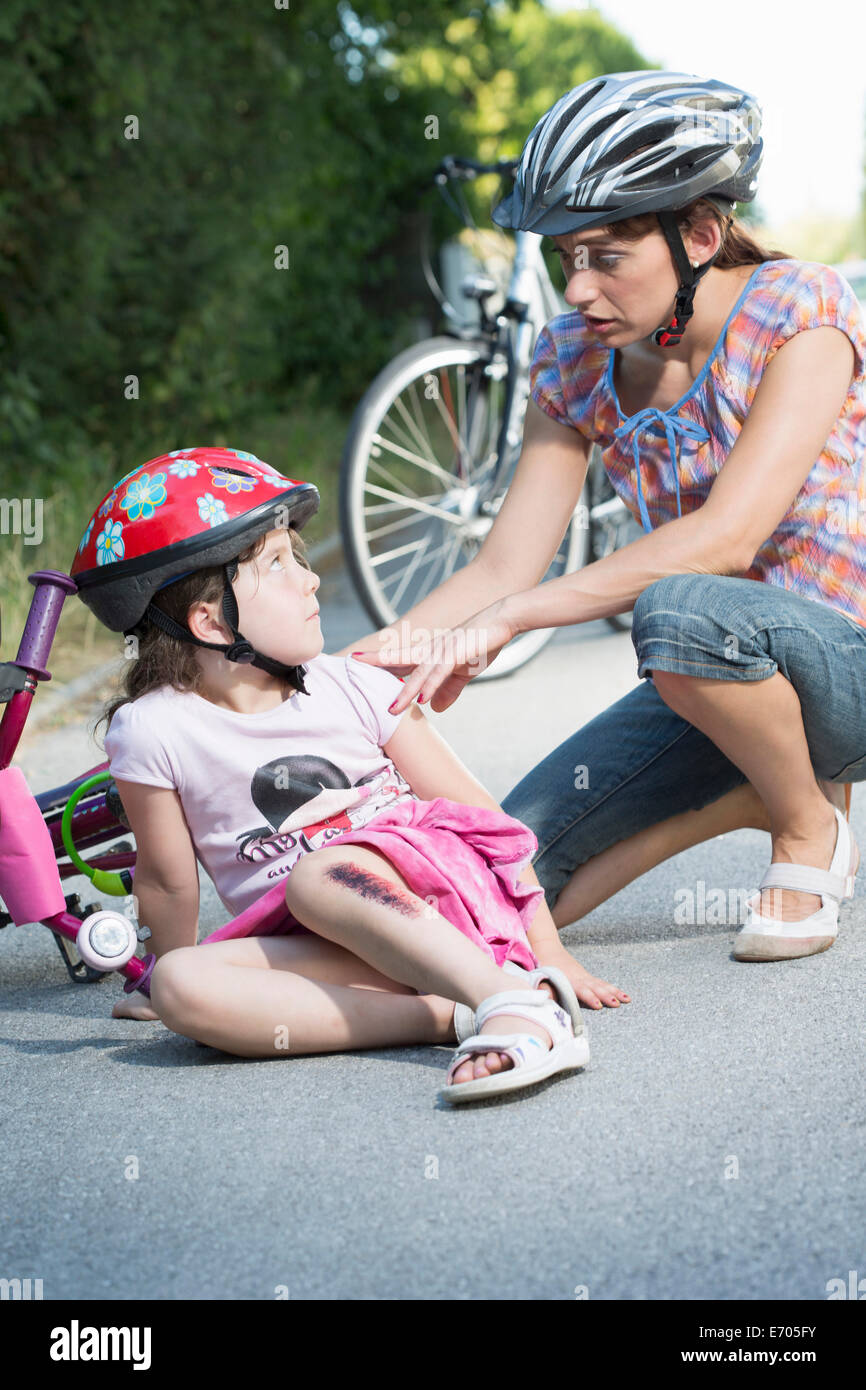 Woman fallen off her bicycle hi-res stock photography and images - Alamy