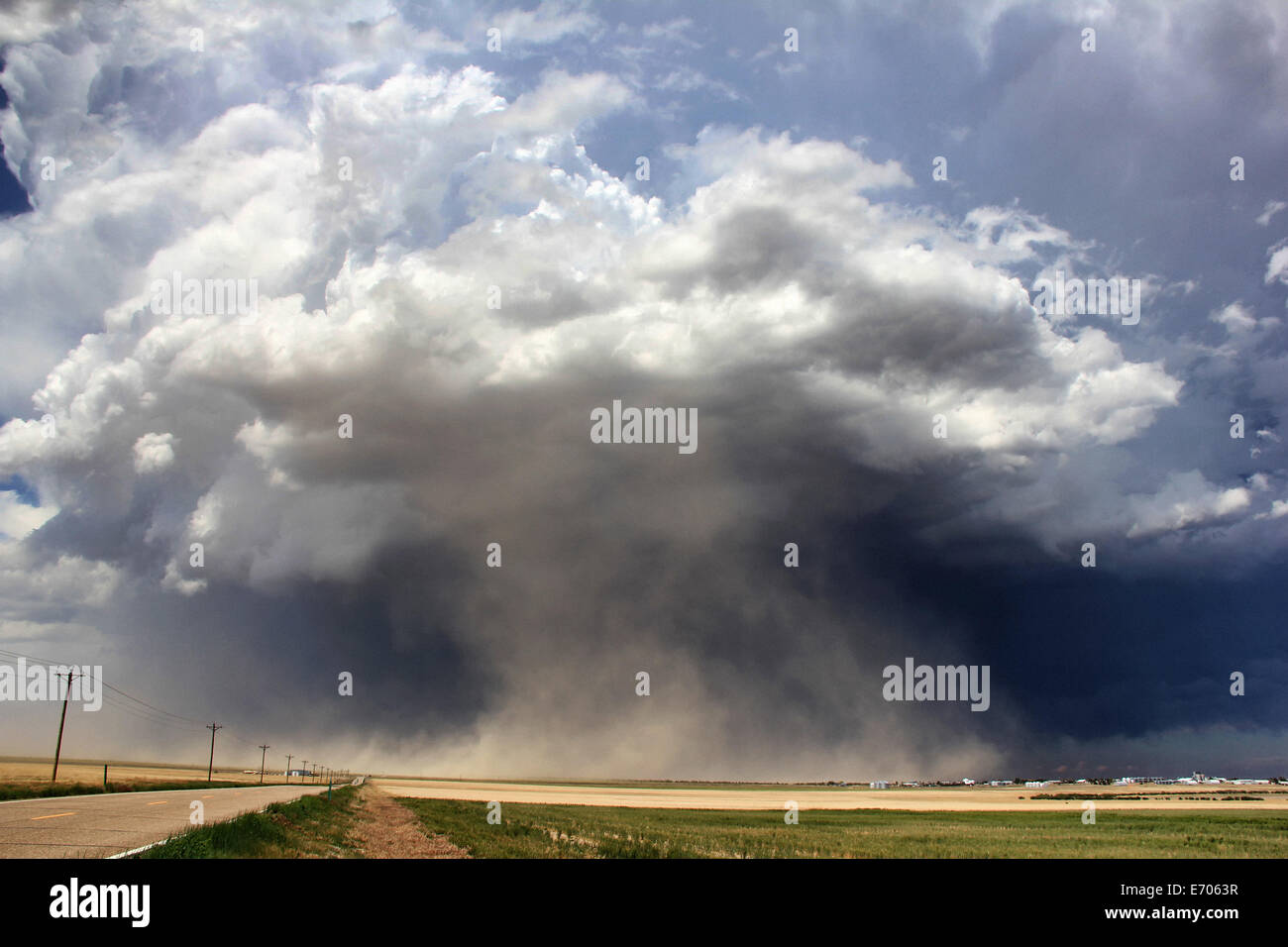 A massive supercell sucks up dust into the updraft leading to a violent ...