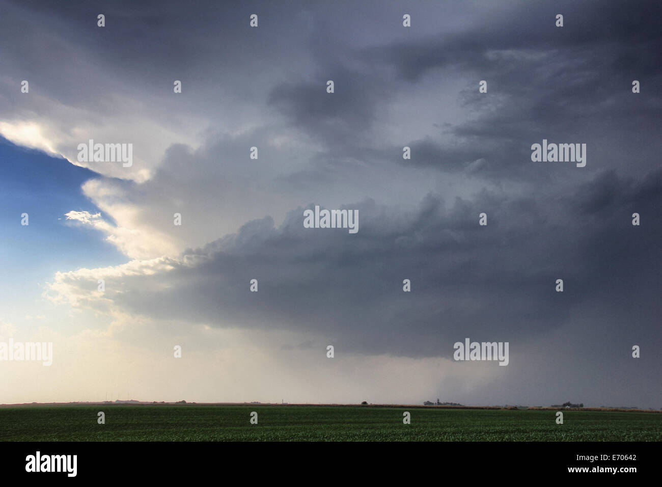 Rapidly rotating wallcloud with striations about the updraft base forms ...