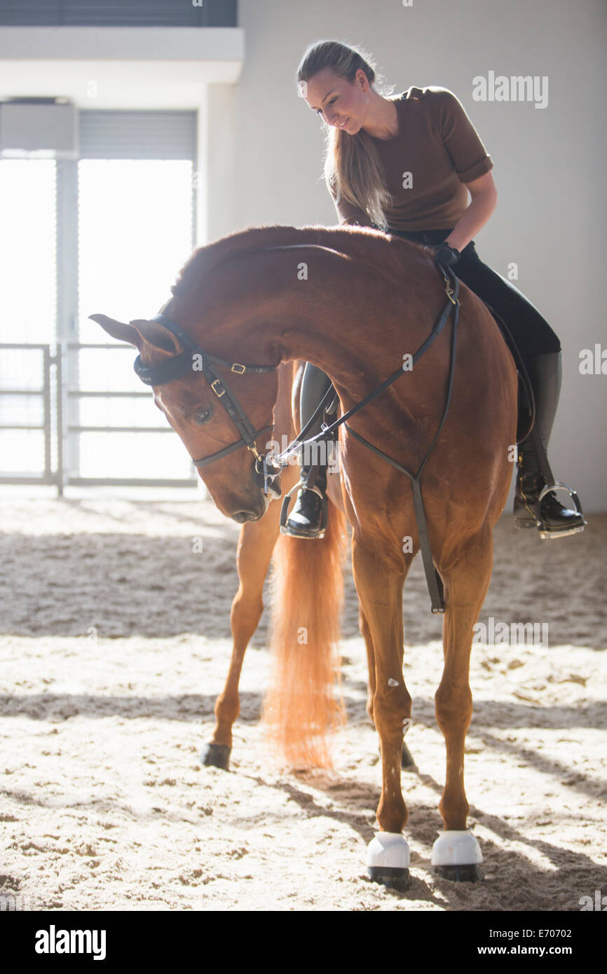 Female horse riding indoor hi-res stock photography and images - Alamy