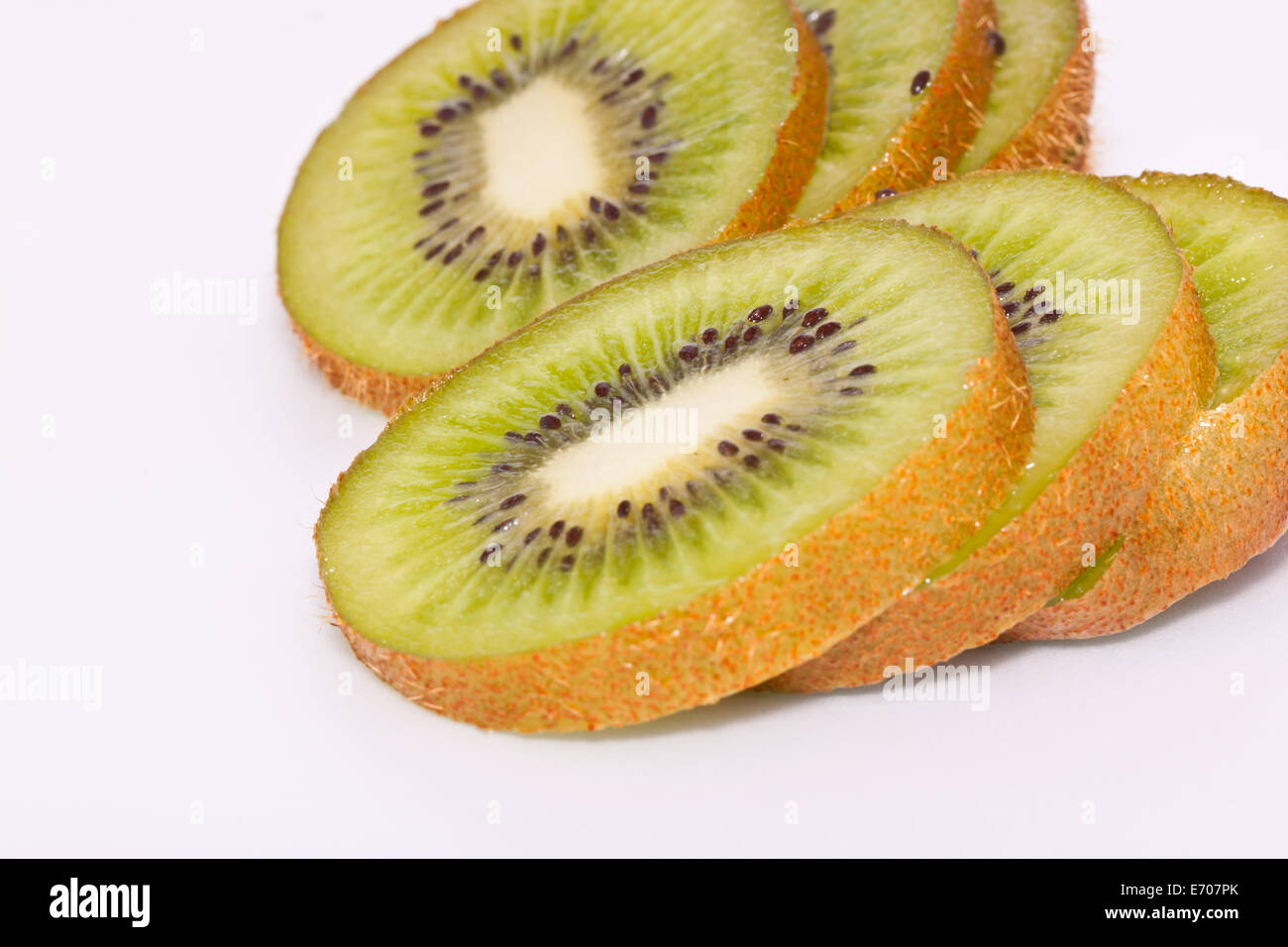 kiwi on paper background Stock Photo - Alamy