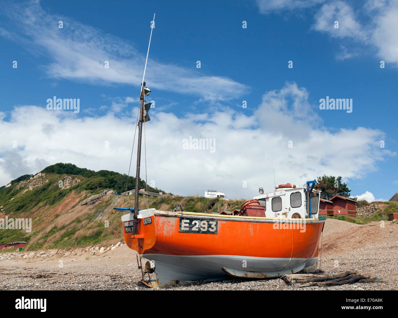 Orange sailing boat Stock Photo - Alamy