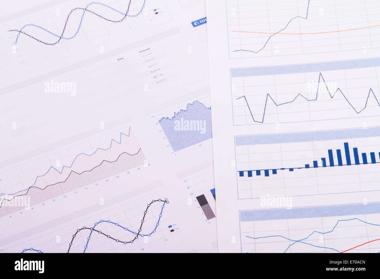 Business table with bar chart graphs Stock Photo - Alamy