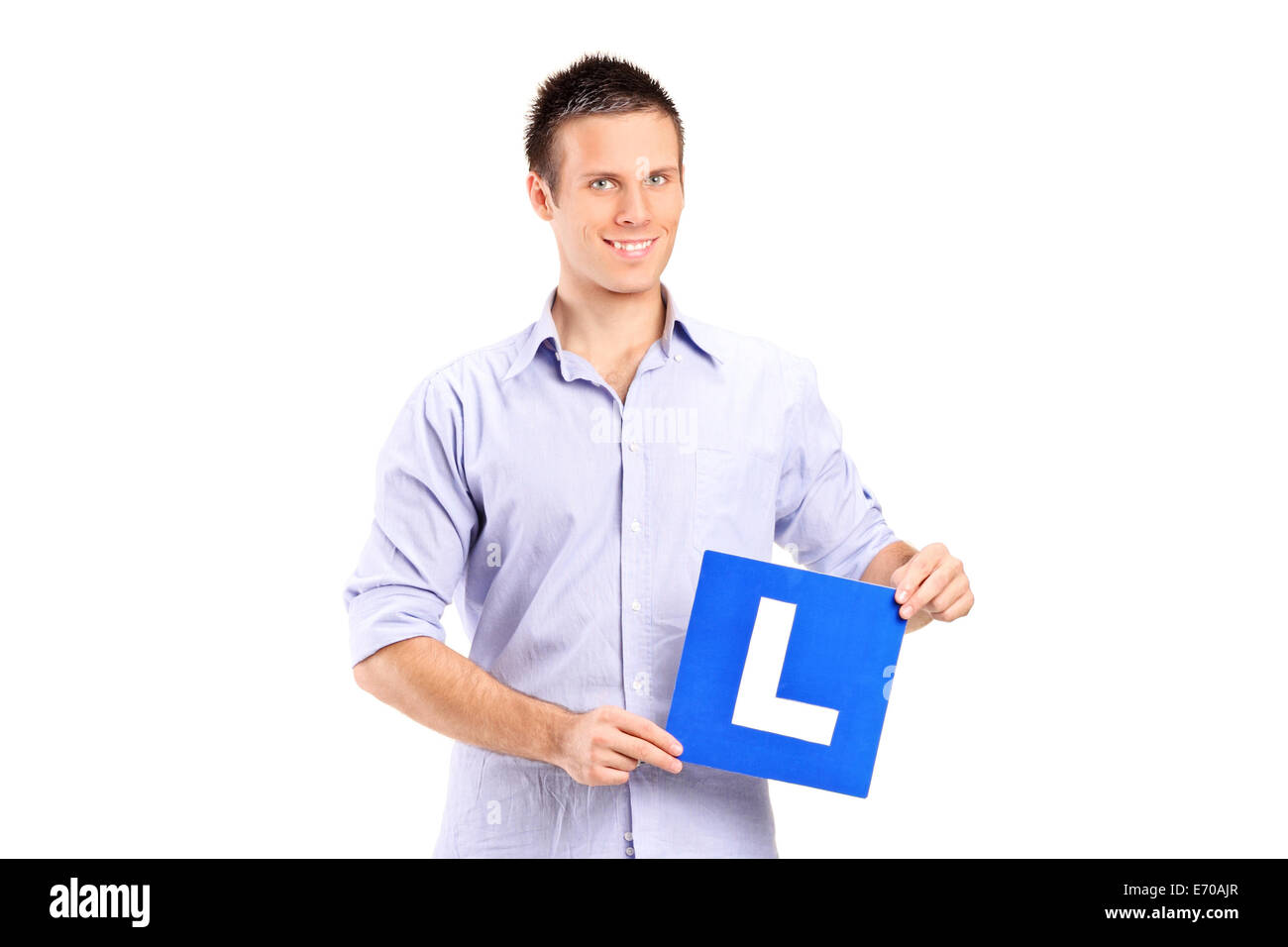 Young man holding a L sign isolated on white background Stock Photo - Alamy