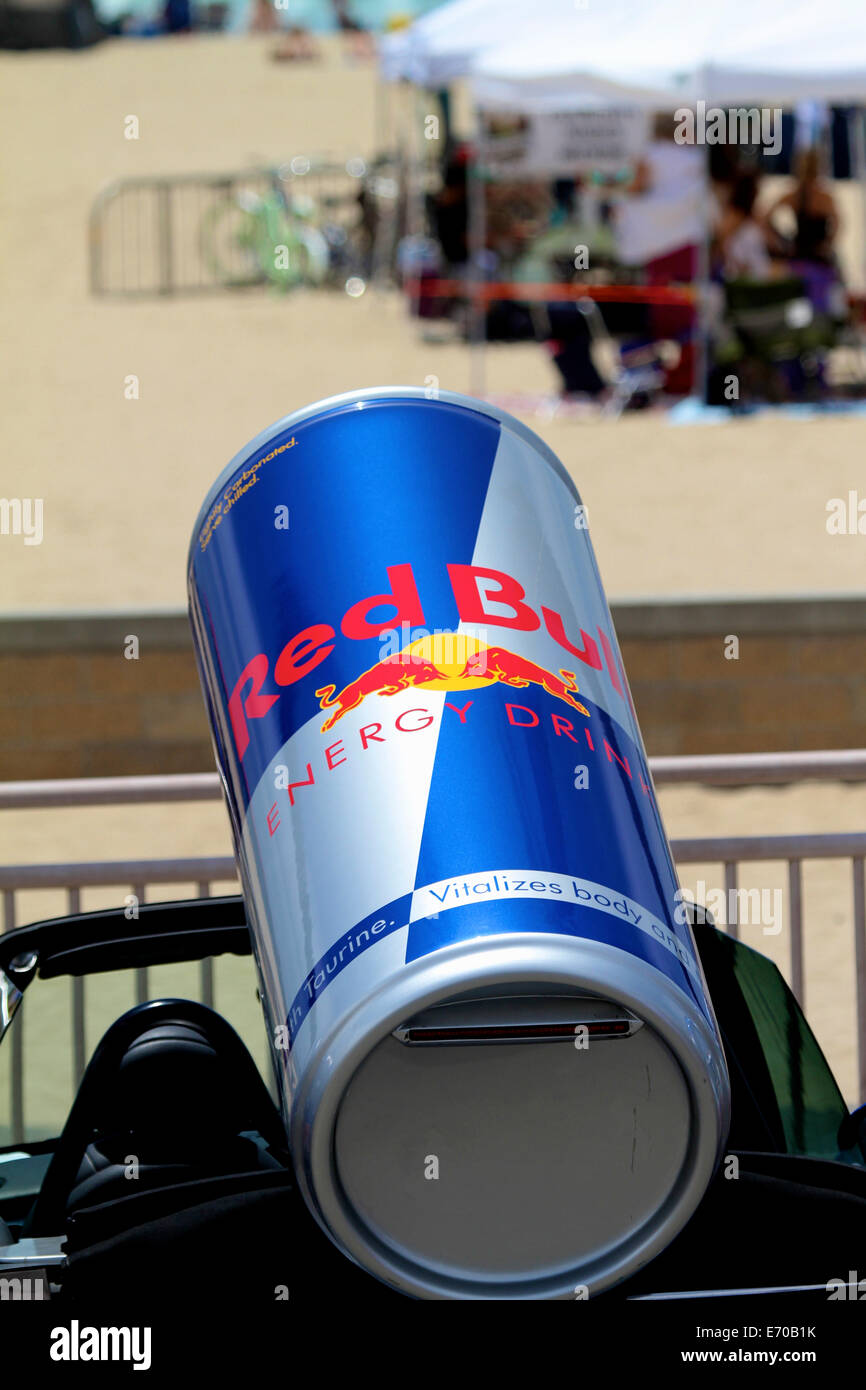 Red Bull energy drink promotional can mounted on top of a mini at a ...