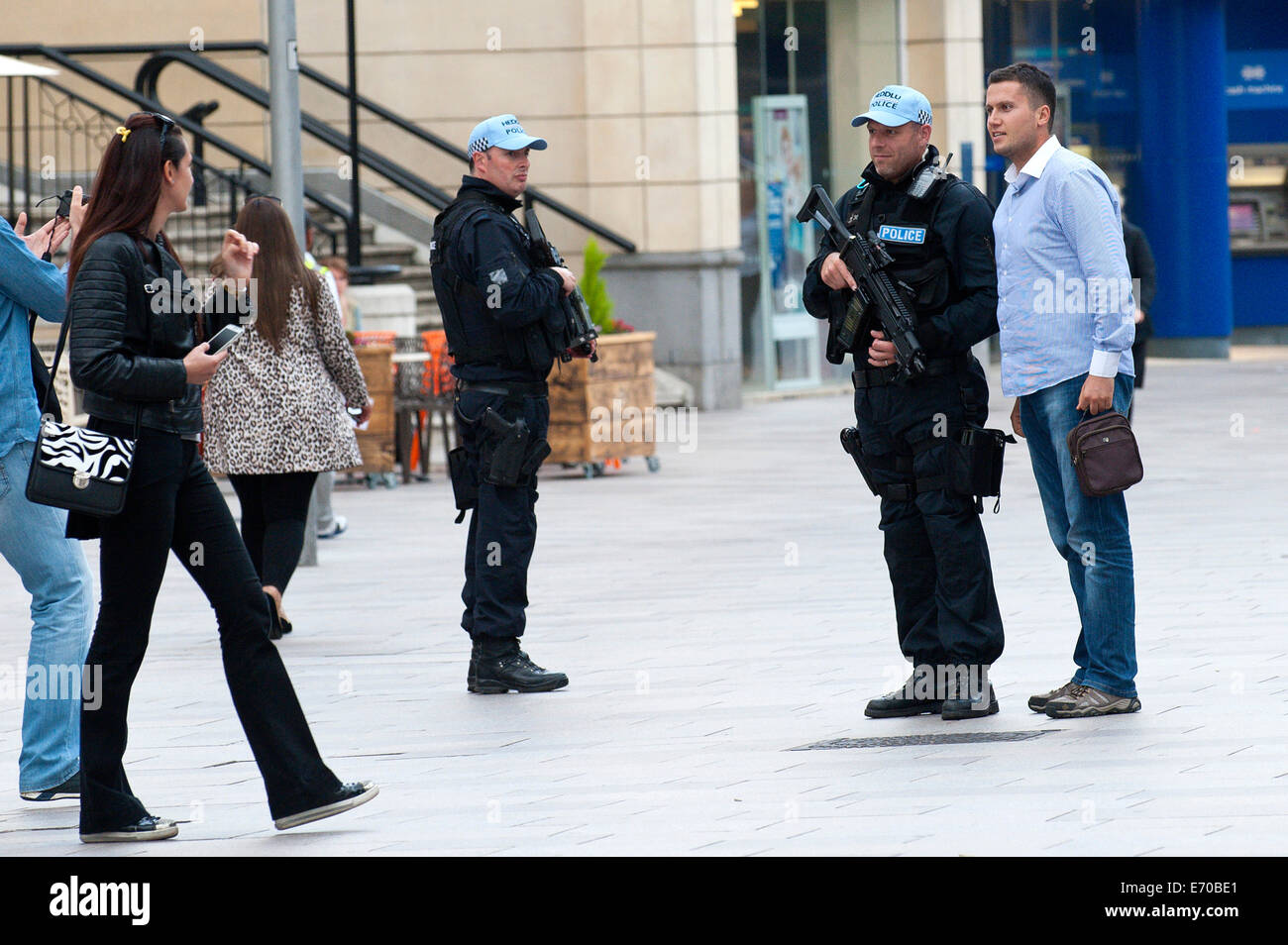 Cardiff, UK. 2nd September 2014. Armed police pose for a photo in the ...
