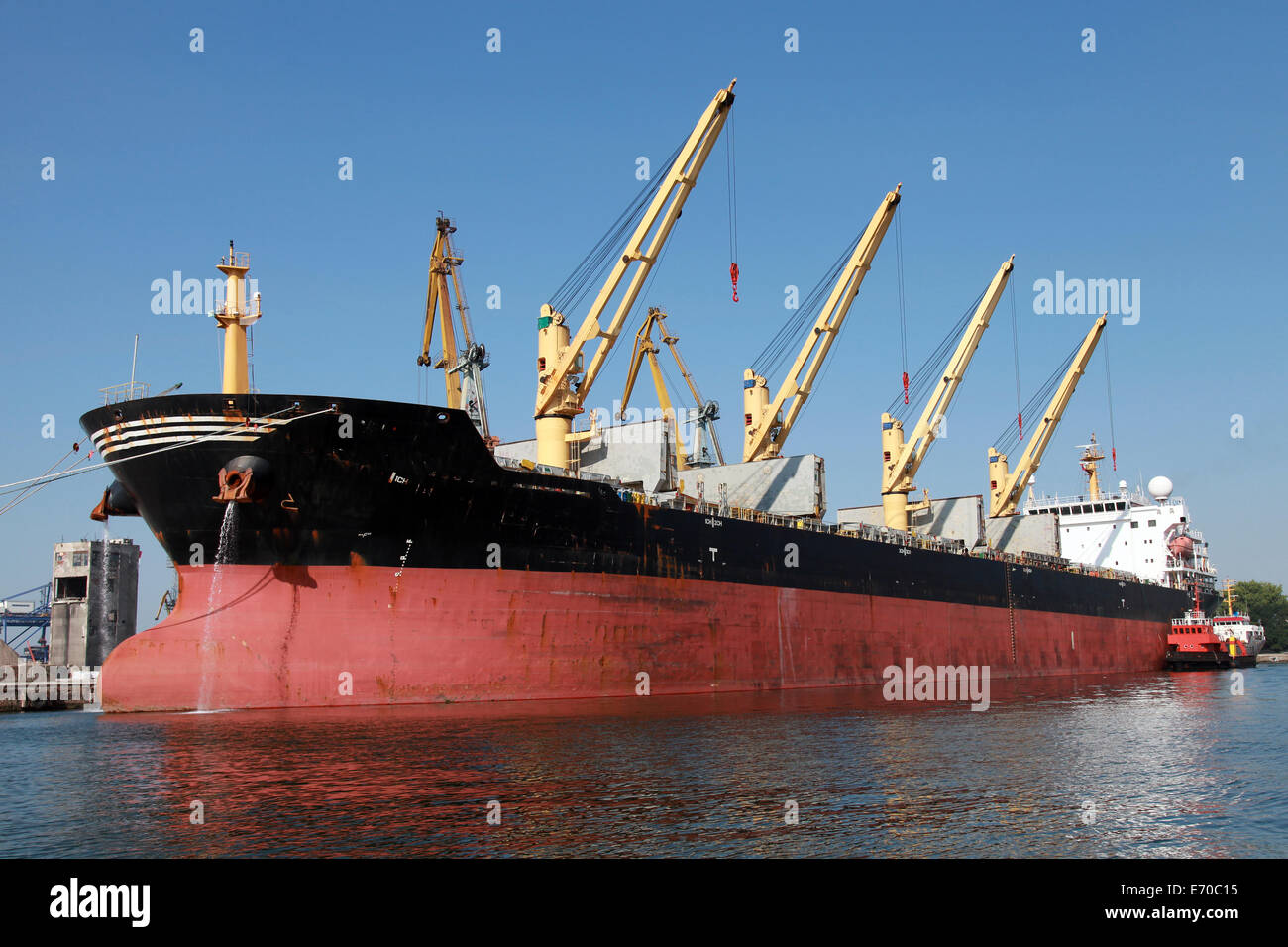 Loading cargo ship in hi-res stock photography and images - Alamy