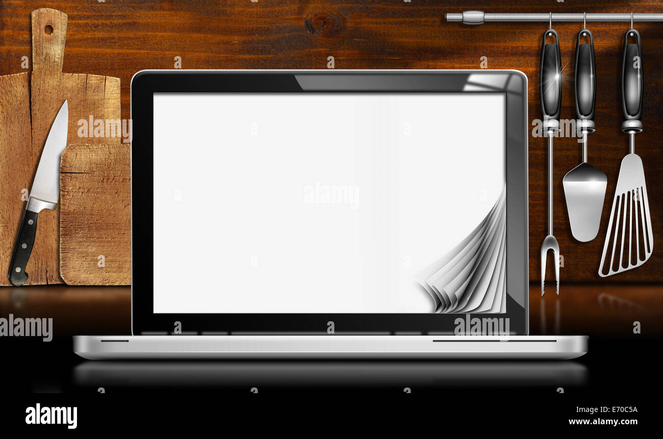 Black laptop computer with blank pages in a kitchen with cutting boards ...