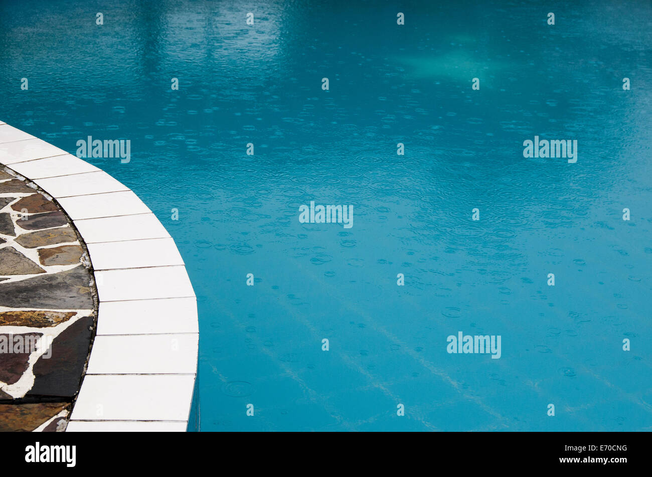 Rain in the pool Stock Photo - Alamy