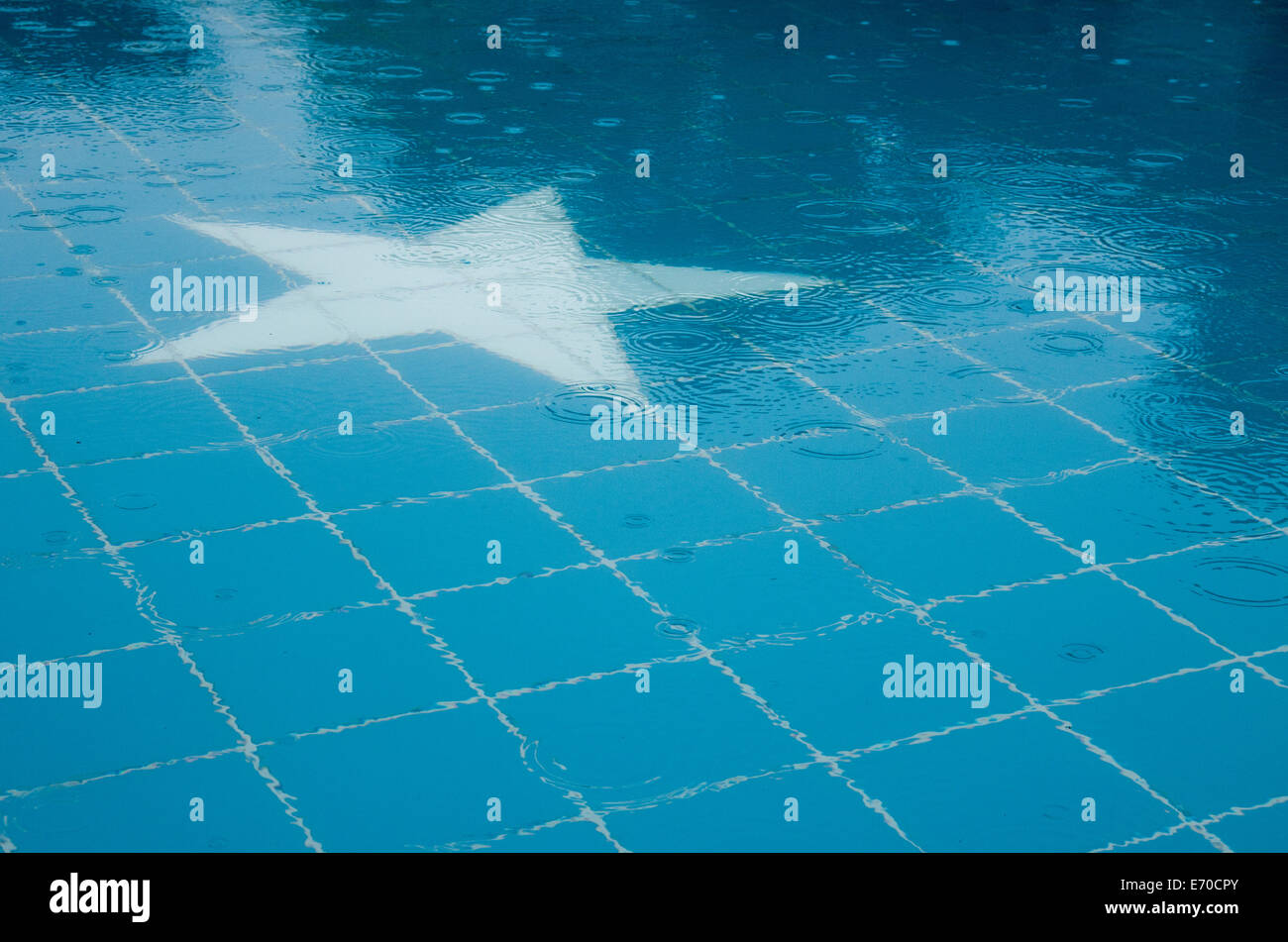 Rain in the pool Stock Photo - Alamy