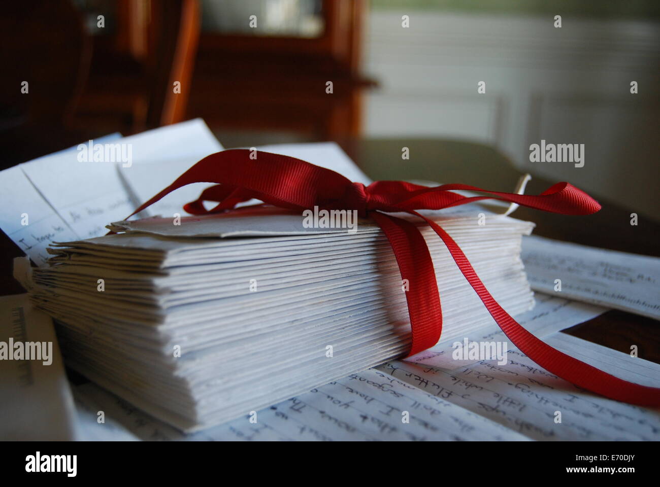 Letters tied ribbon hi-res stock photography and images - Alamy