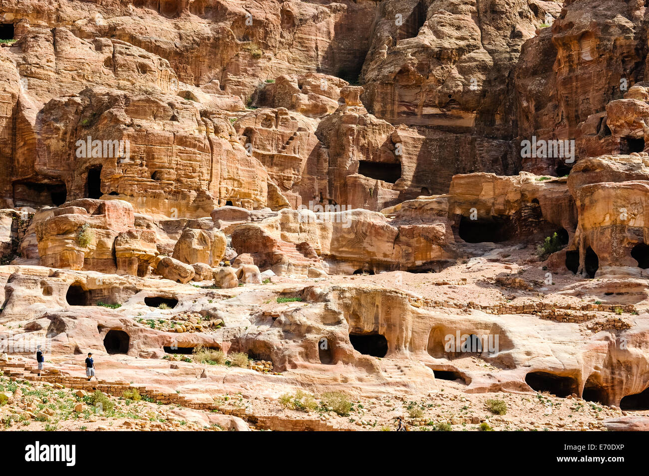 Petra is Jordan's most visited tourist attraction. Rock-cut tomb Stock ...