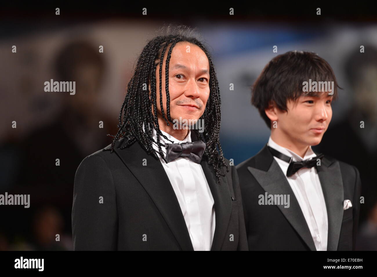Venice, Italy. 2nd Sep, 2014. Actor Tatsuya Nakamura (L) poses on the ...