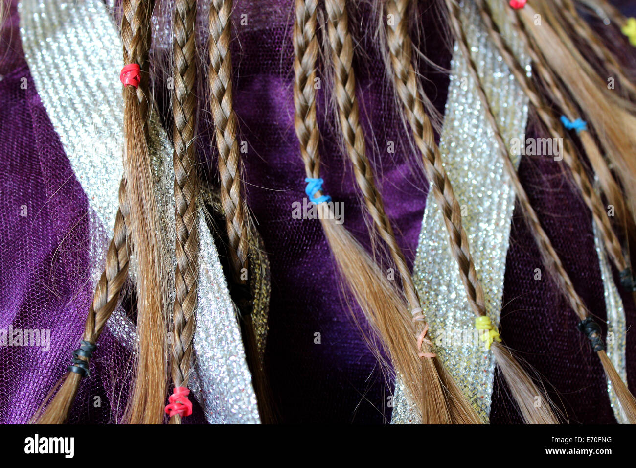some girl's plaits on the fabric pattern of the Moroccan suit Stock ...