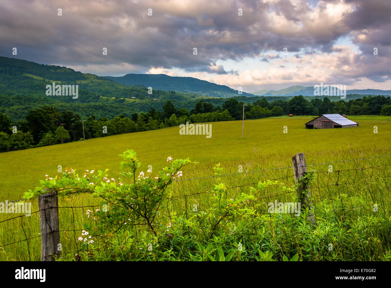 Fence and morning view of mountains in the rural Potomac Highlands of ...
