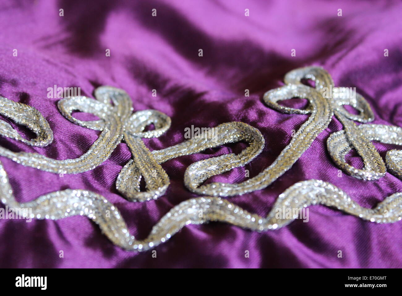 fabric pattern on the violet Moroccan suit Stock Photo - Alamy