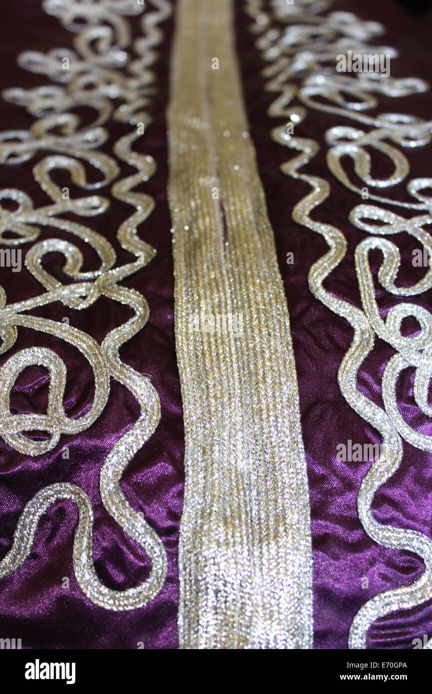 fabric pattern on the violet Moroccan suit Stock Photo - Alamy