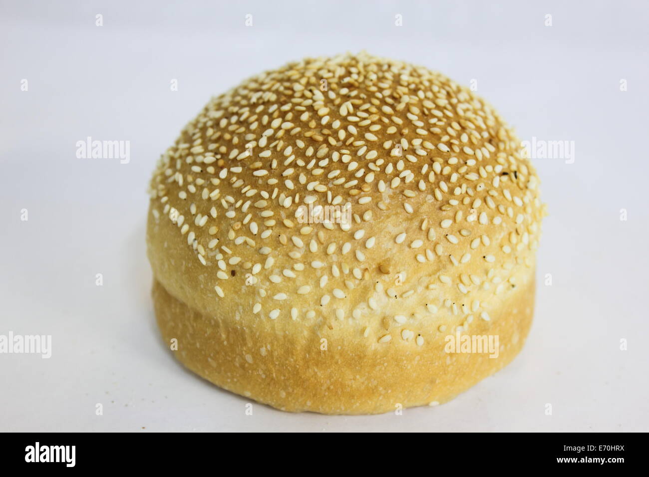 Closeup of Burger Bun on white background Stock Photo - Alamy