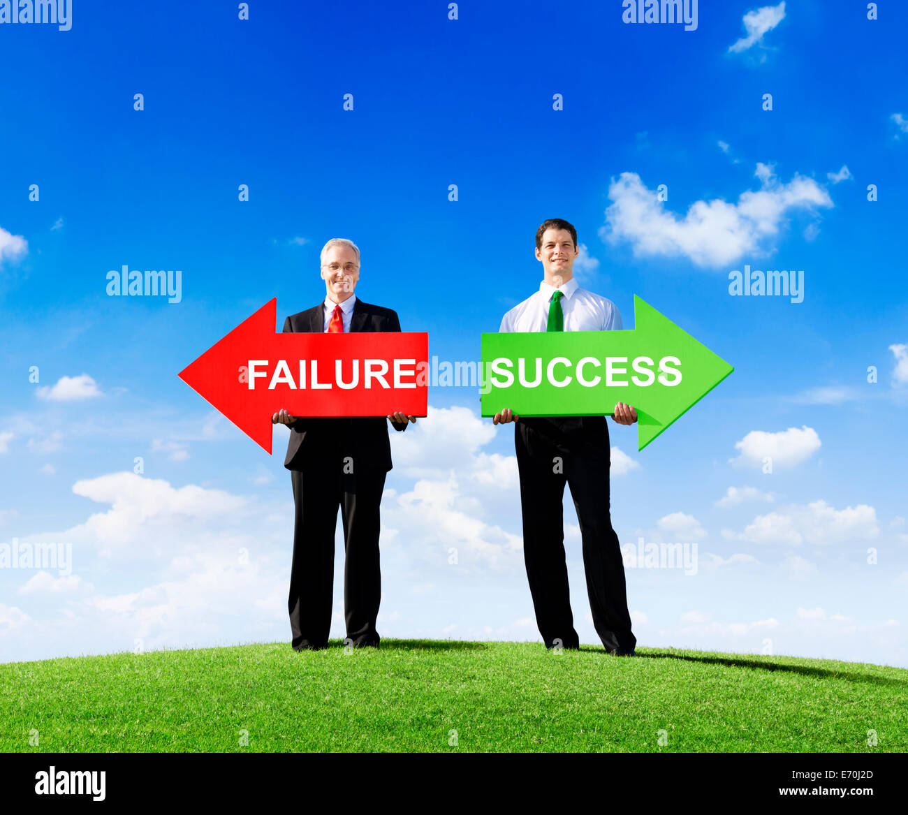 Two businessmen giving options on the hills Stock Photo - Alamy
