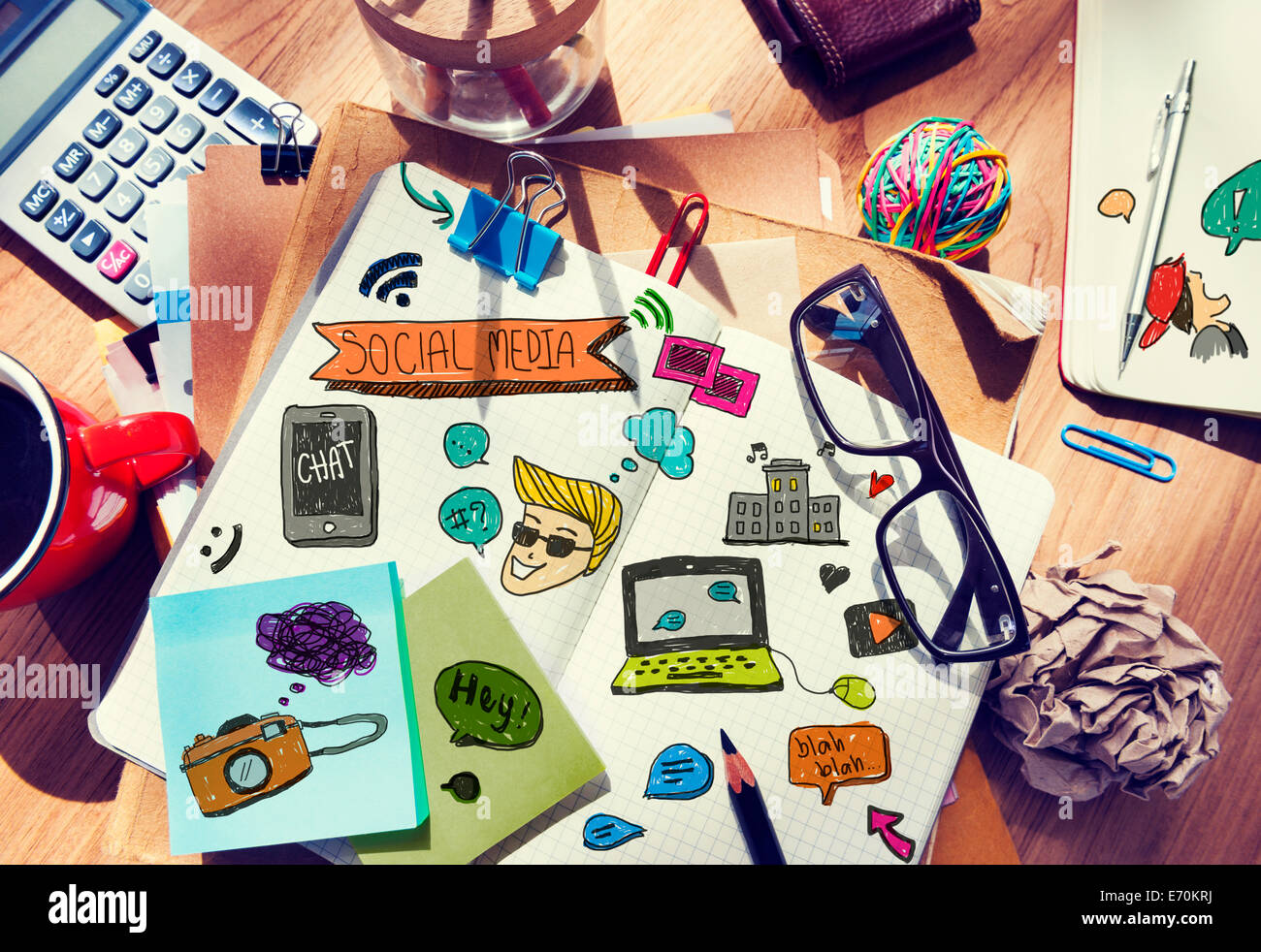 Designer's Table with Social Media Notes and Tools Stock Photo - Alamy