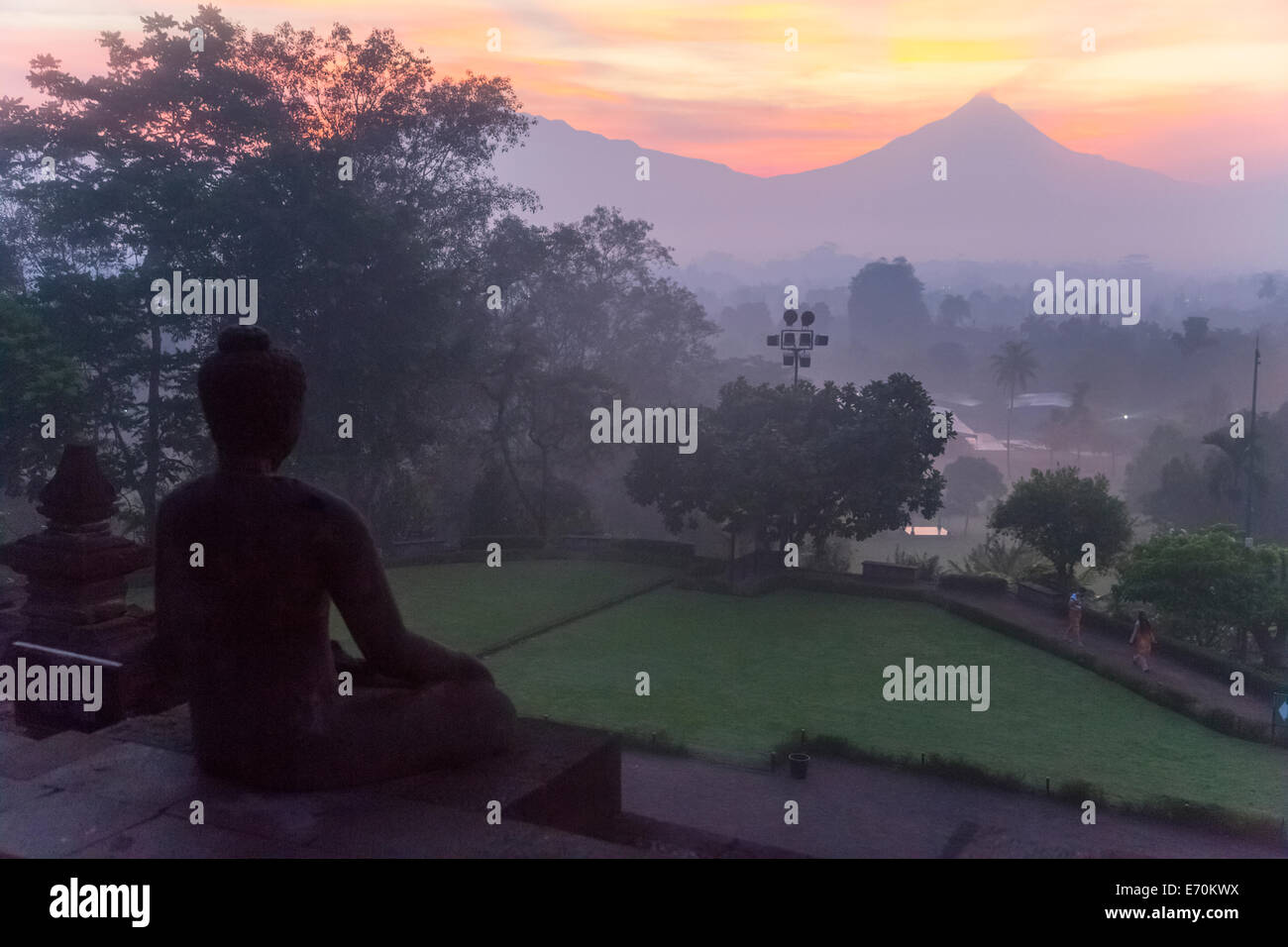 Borobudur, Java, Indonesia. Buddha Statue and Mount Merapi at Sunrise ...