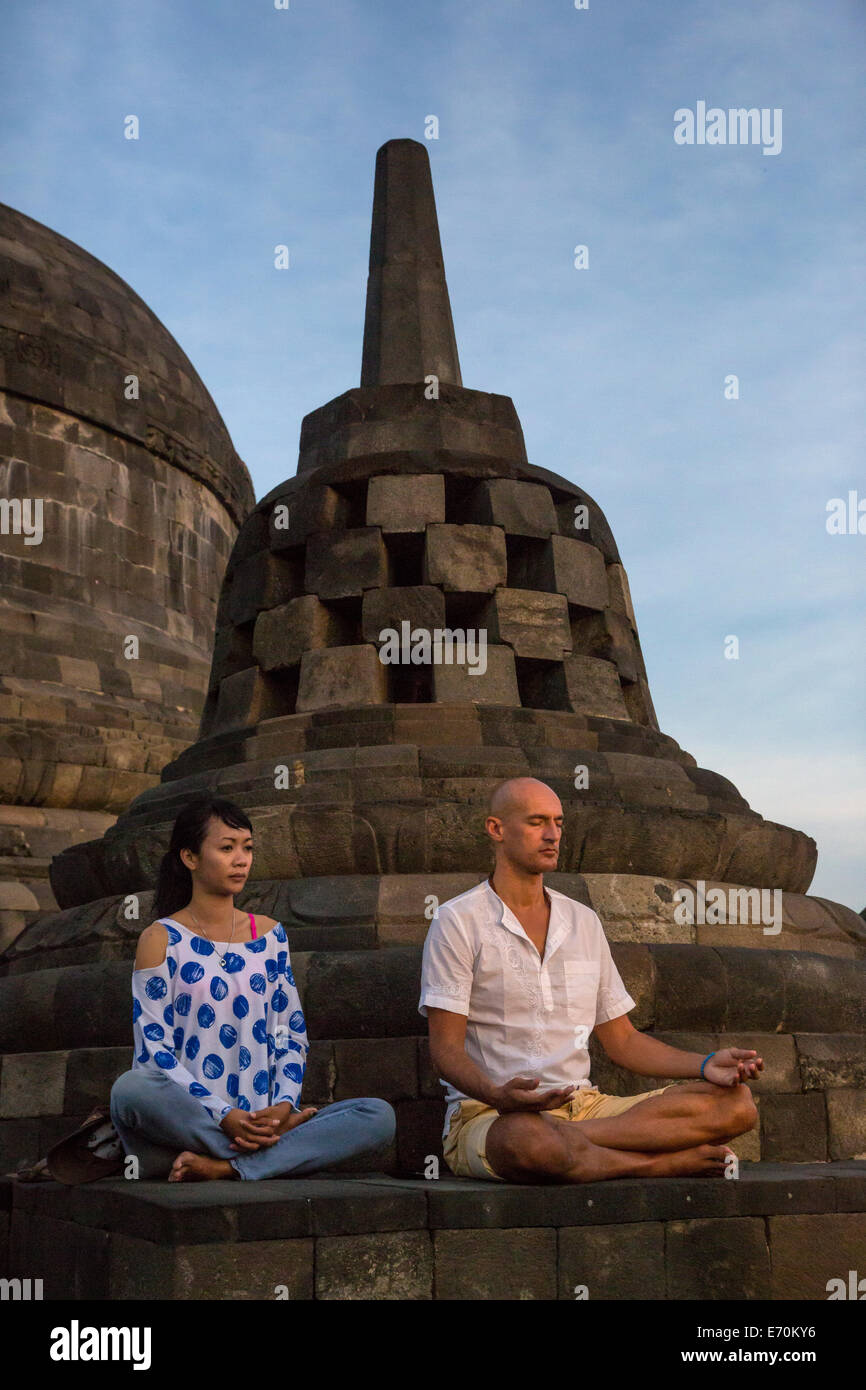 Man and woman praying hi-res stock photography and images - Alamy