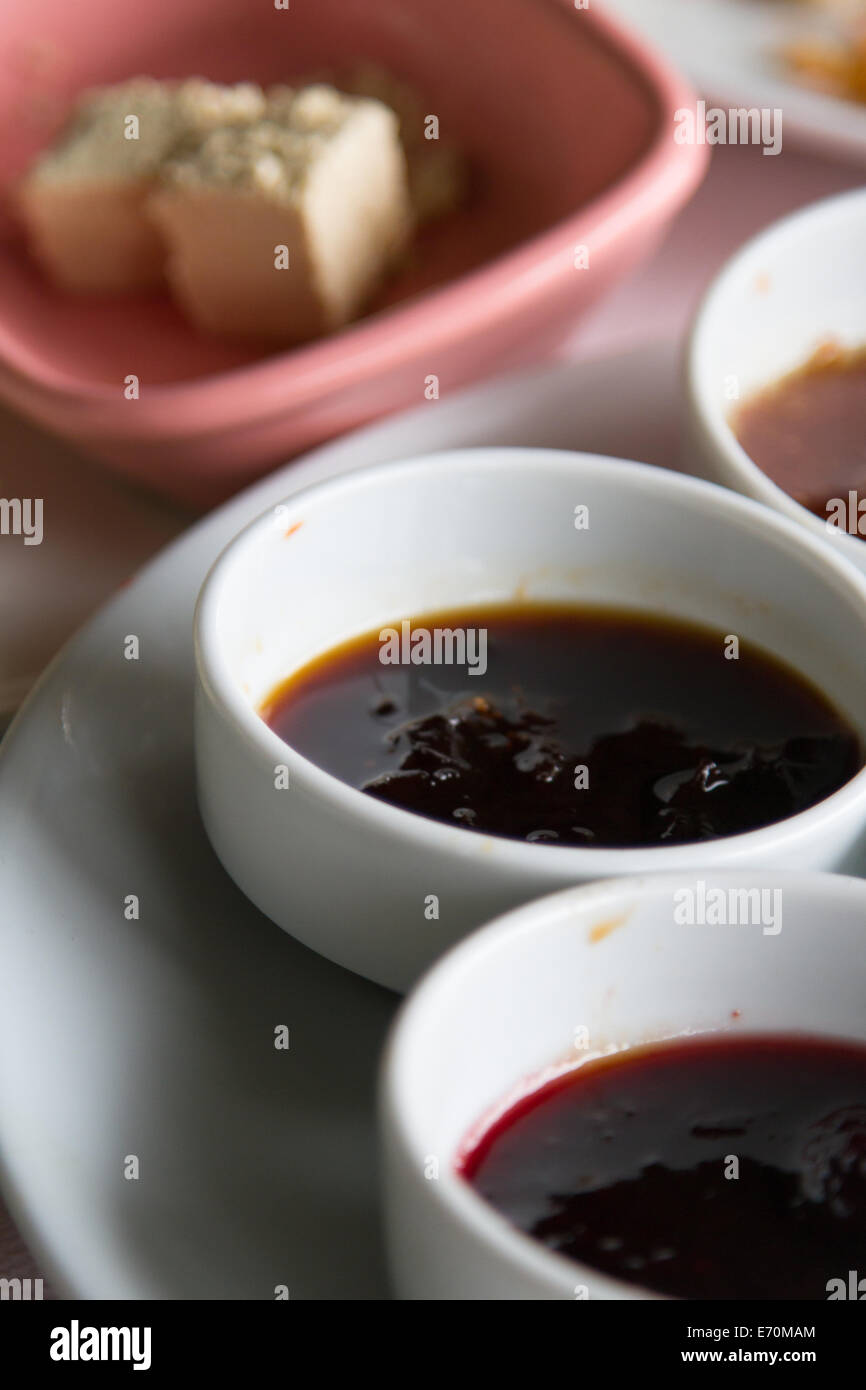 Breakfast service, jam in white bowl Stock Photo - Alamy