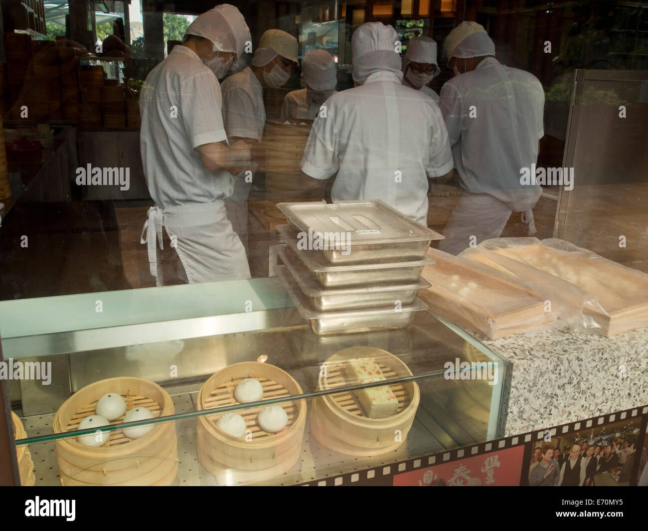 Chefs working at a Dim Sum restaurant at Sentosa island in Singapore ...