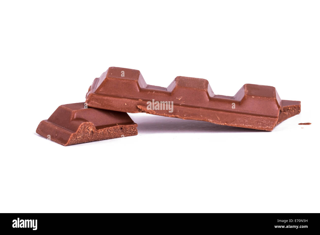 Broken milk chocolate bar pieces, isolated on white background Stock ...