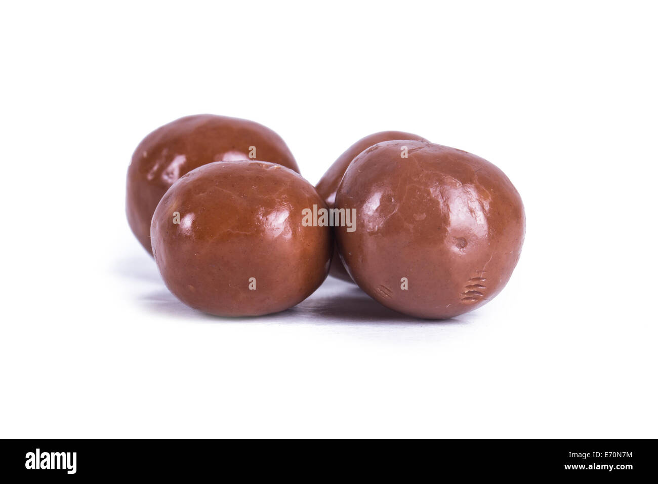 Round milk chocolate candy, isolated on white background Stock Photo ...