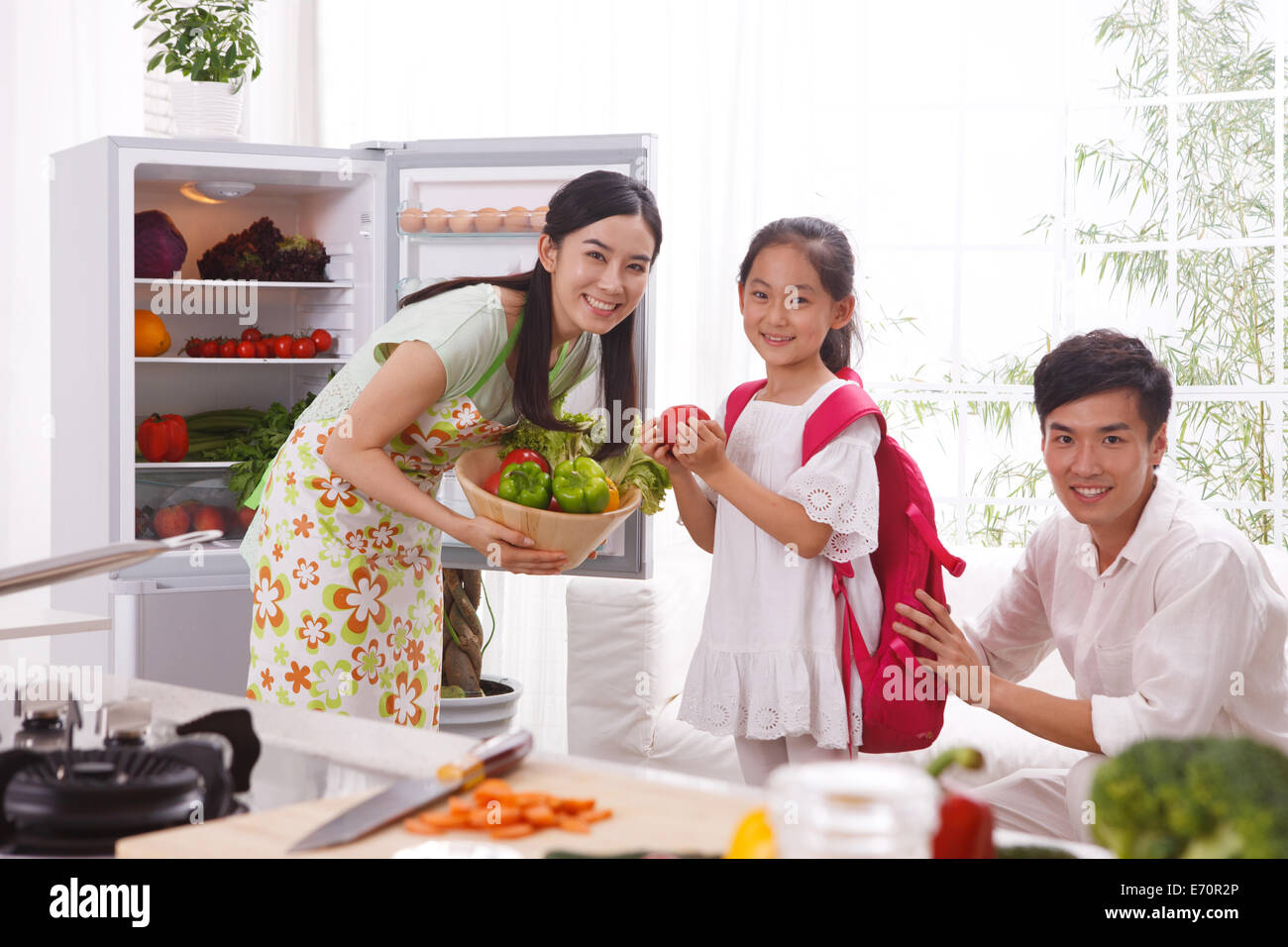 Family cooking in kitchen Stock Photo - Alamy