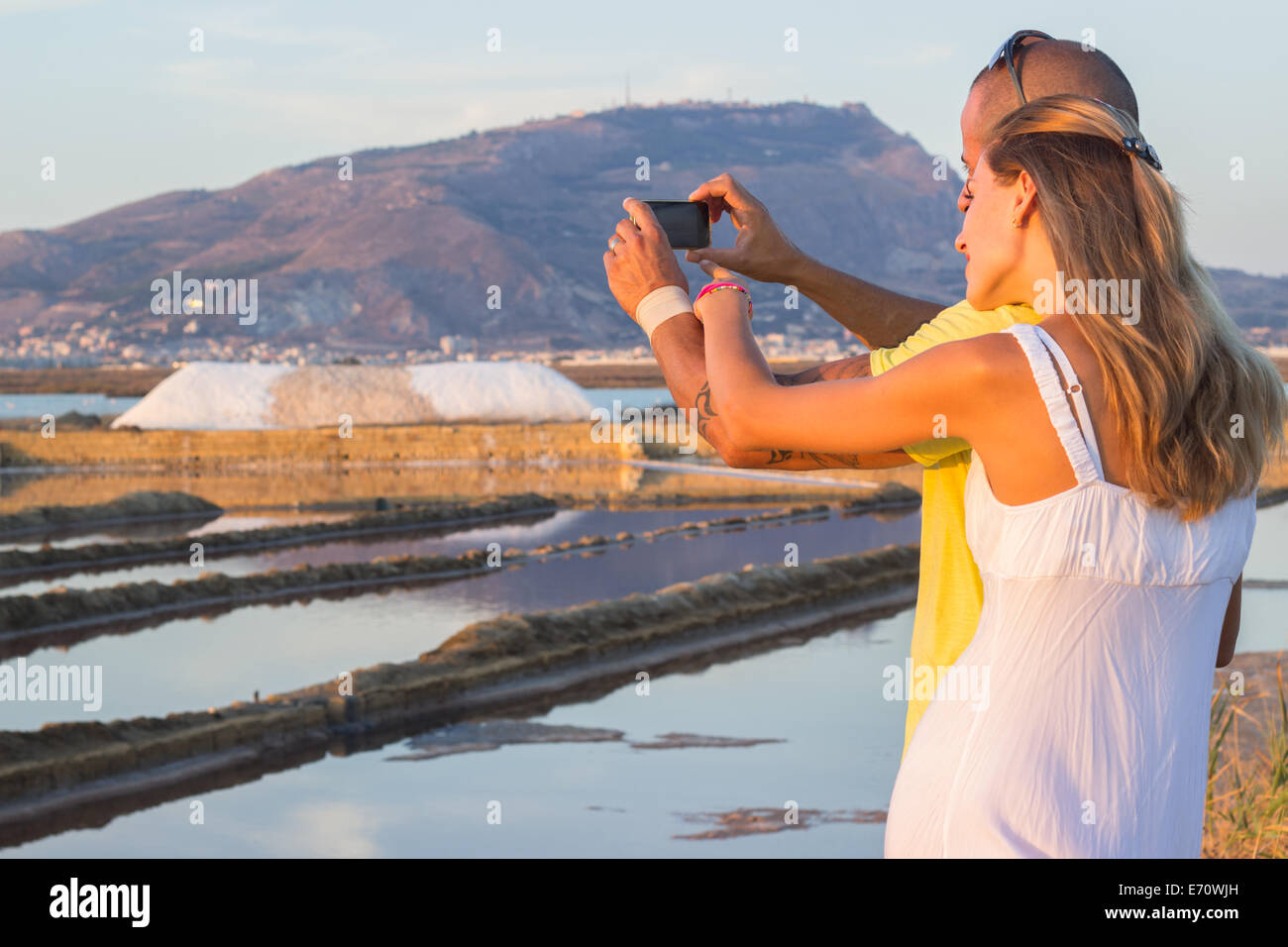 couple man woman photographing "salt marsh" salt mounds landscape Erice ...