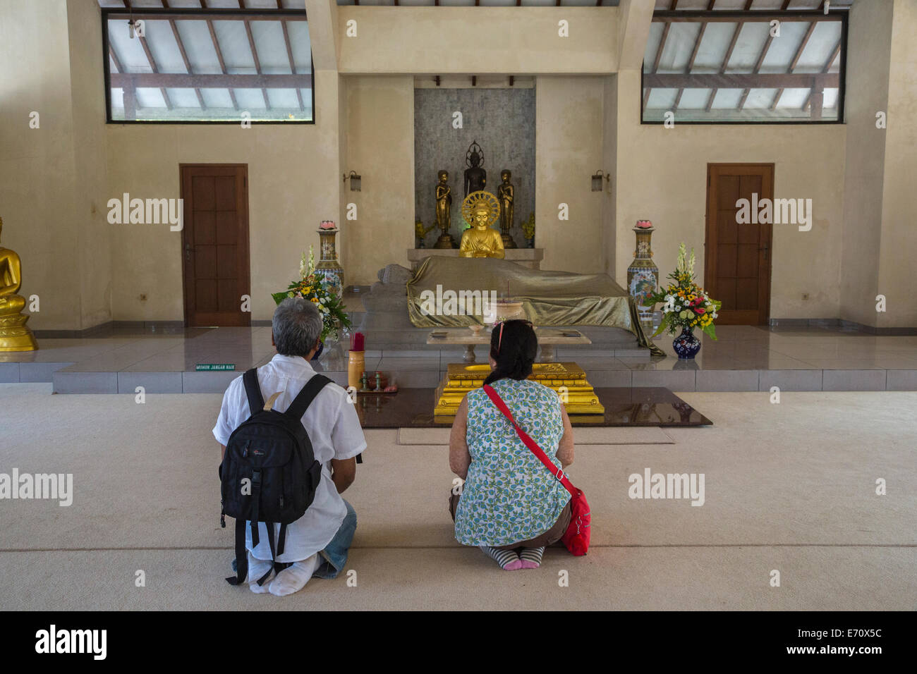 Borobudur, Java, Indonesia. Mendut Buddhist Monastery. Visitors Pray in ...