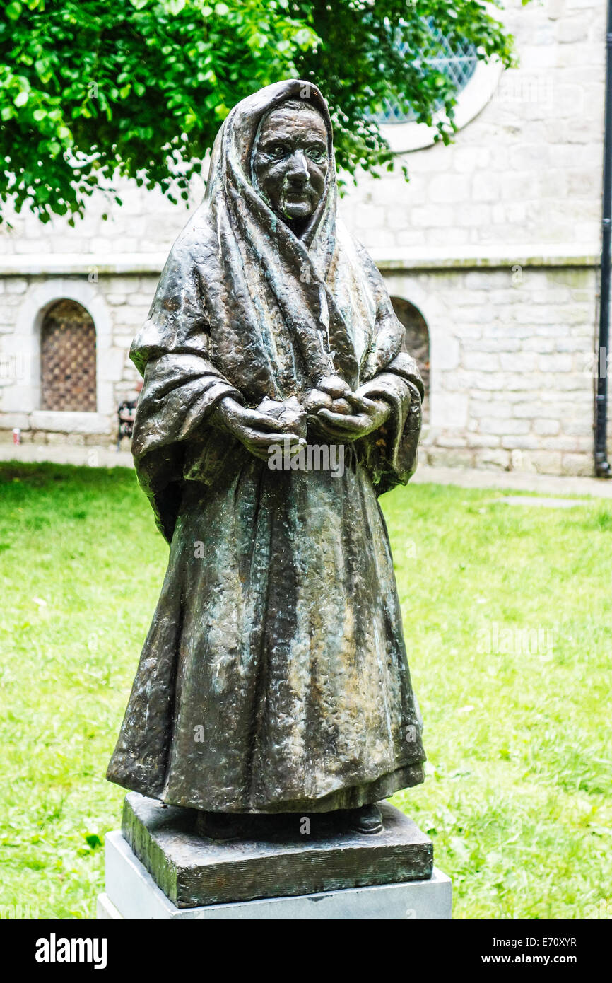 A statue of The Onion seller in the City of Cork, Ireland Stock Photo ...