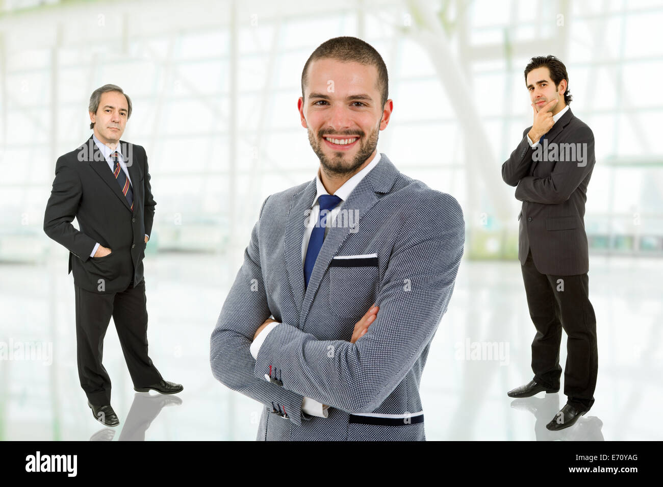 Three young men pose hi-res stock photography and images - Alamy