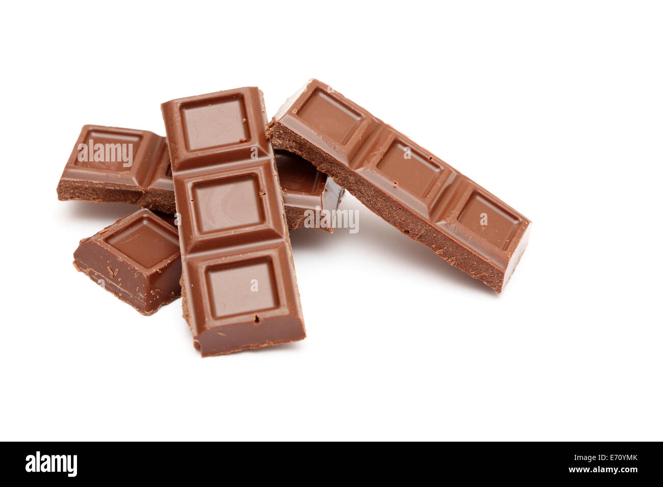 Chocolate blocks on white background Stock Photo - Alamy