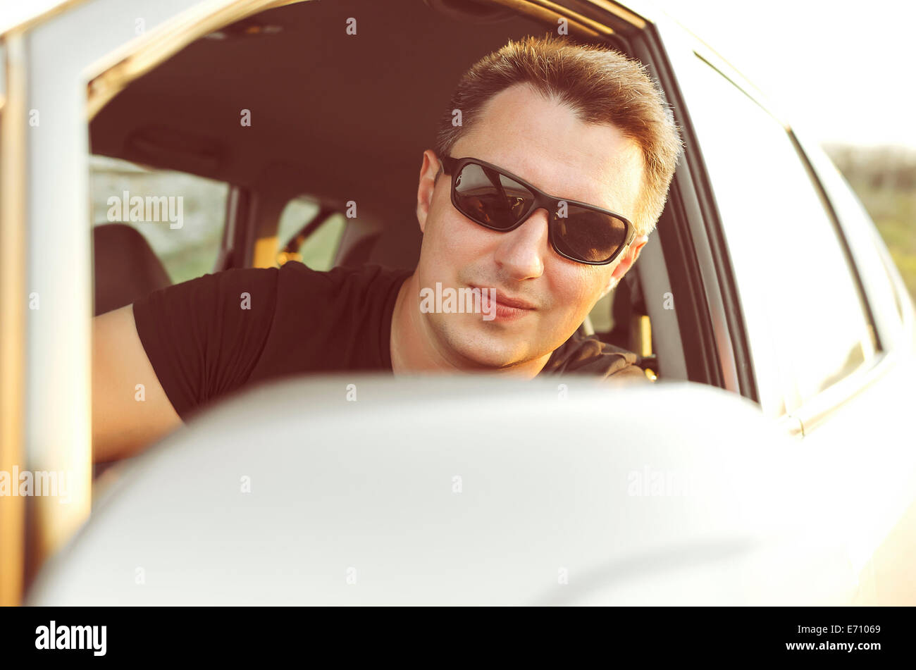 Man drive his car in black sunglasses Stock Photo - Alamy