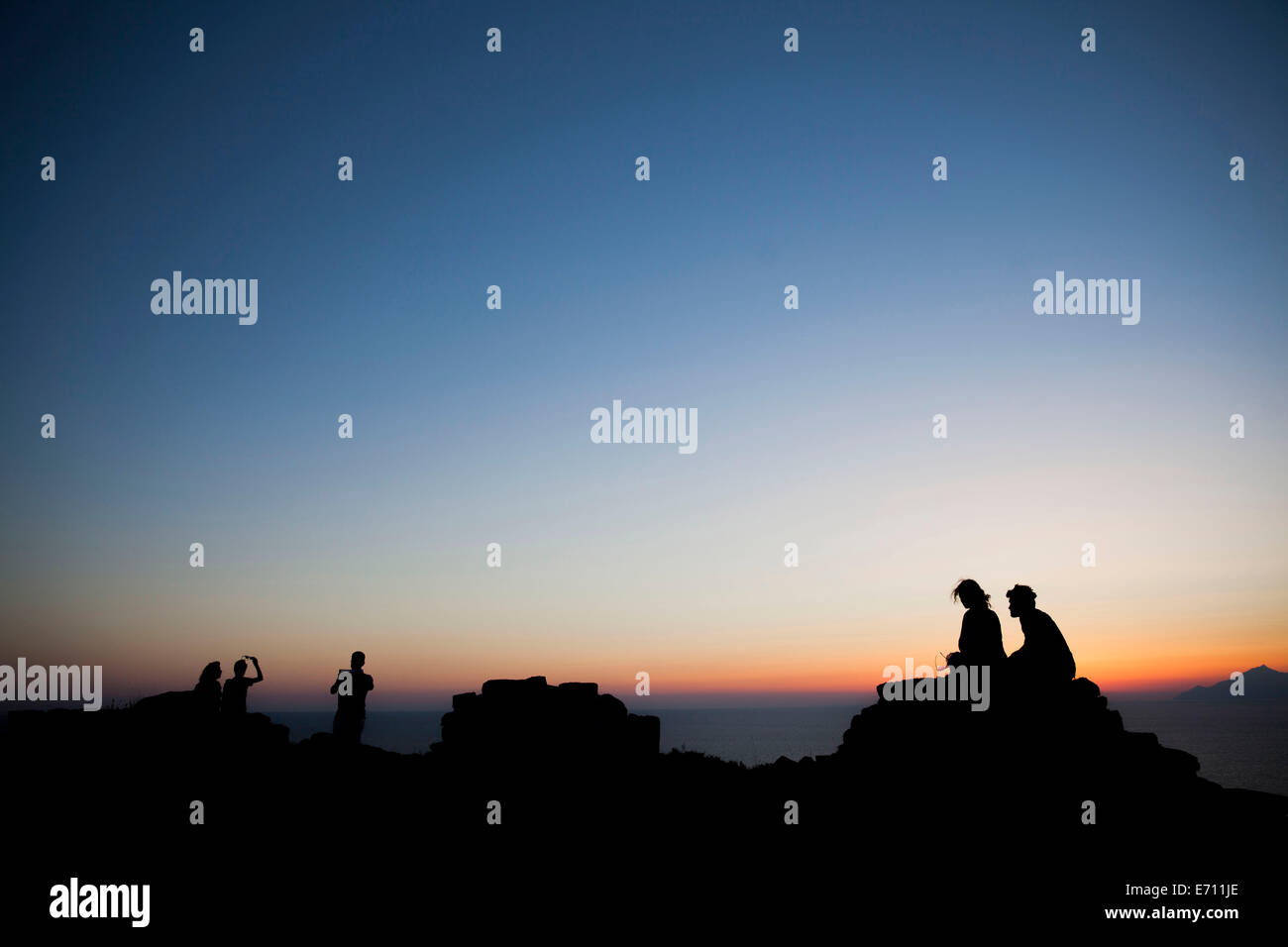People enjoy the sunset from the castle in Lemnos Stock Photo - Alamy