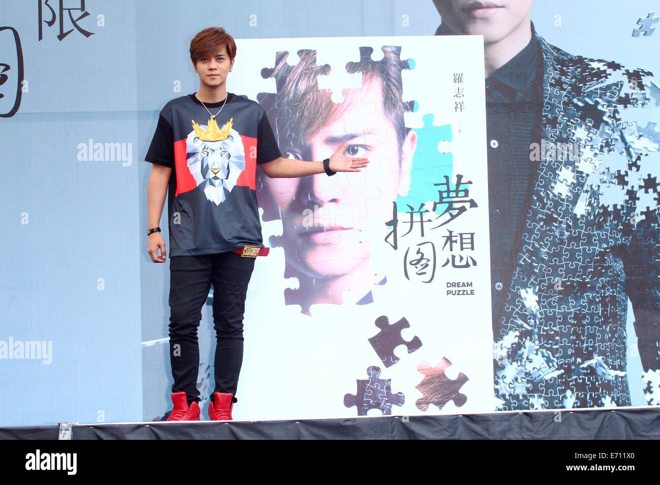 Taipei. 30th Aug, 2014. Singer, actor Show Lo attends a signing session ...