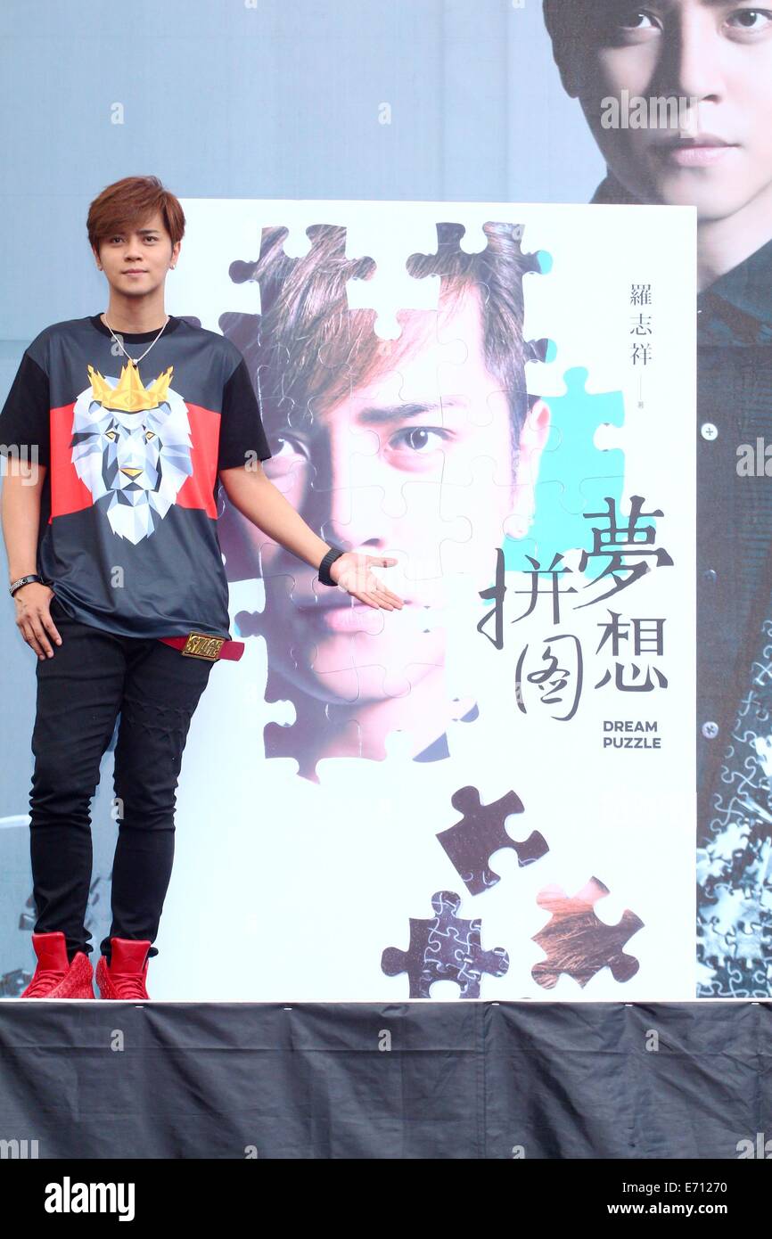 Taipei. 30th Aug, 2014. Singer, actor Show Lo attends a signing session ...