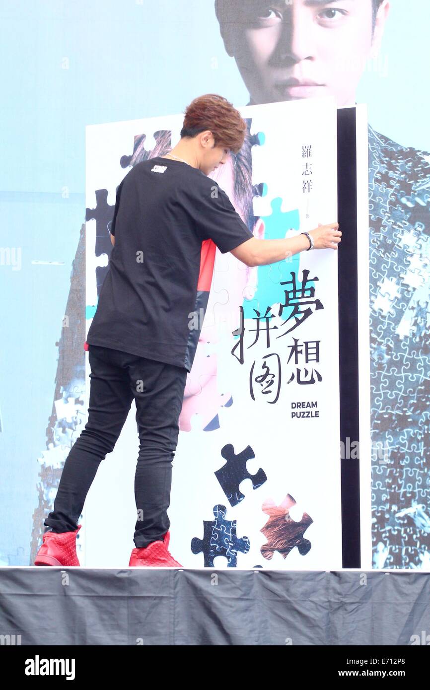 Taipei. 30th Aug, 2014. Singer, actor Show Lo attends a signing session ...
